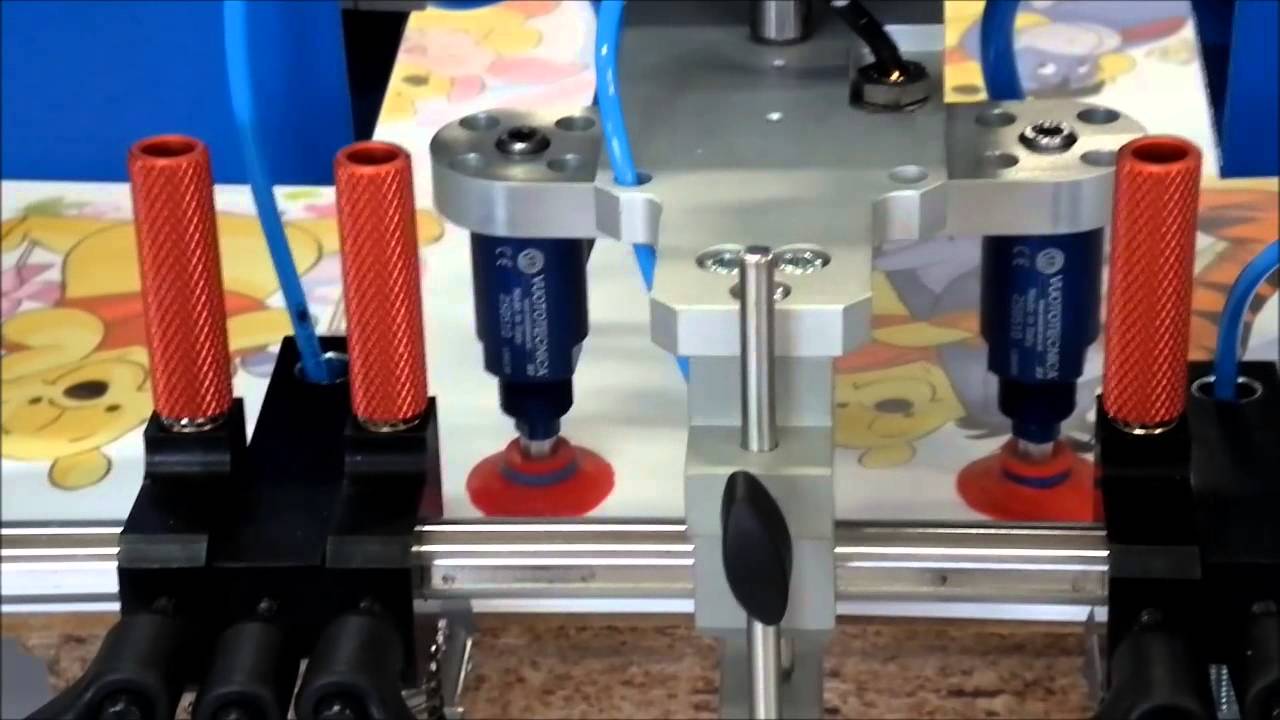 Vuototecnica vacuum cylinders in action on a paper sheets feeder ...